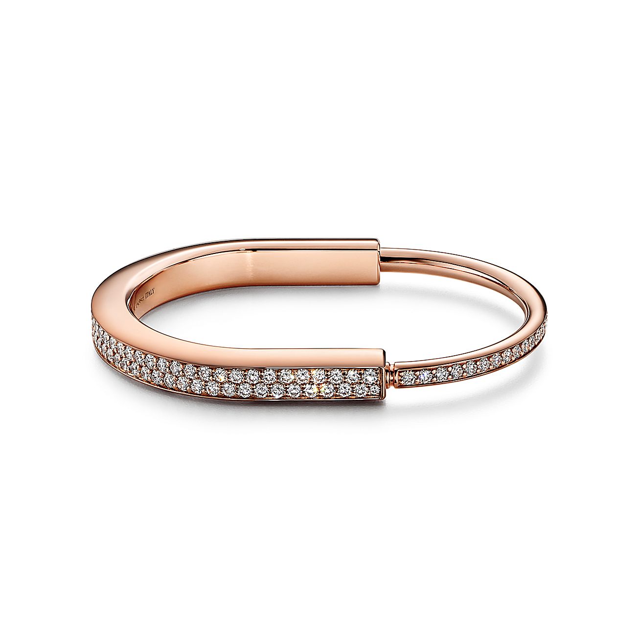 로즈 골드 소재에 풀 파베 다이아몬드가 세팅된 티파니 락 뱅글 | Tiffany & Co.