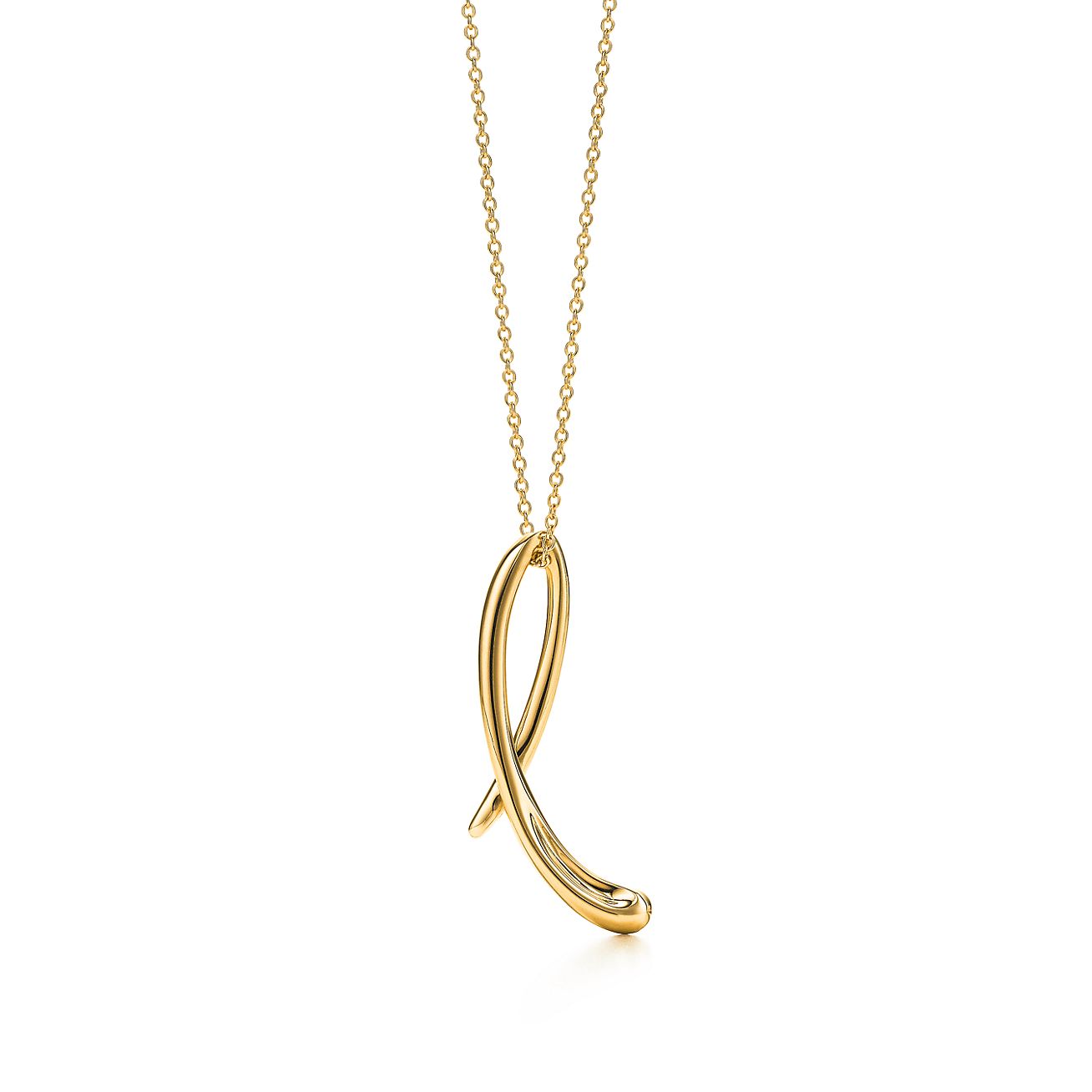 Elsa Peretti® letter "L" pendant in 18k gold. | Tiffany & Co. CA