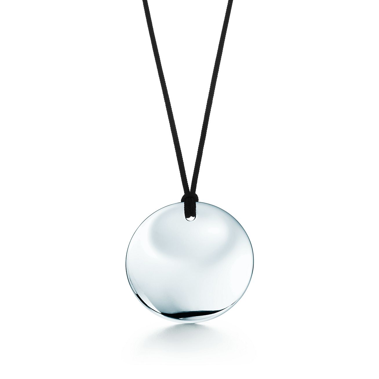 Elsa Peretti® Round pendant in sterling silver on a silk cord ...