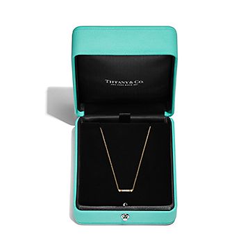 Tiffany fleur de lis key bar pendant store