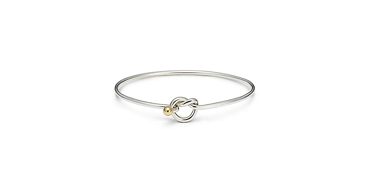 Love Knot bangle in sterling silver with 18k gold. | Tiffany & Co.