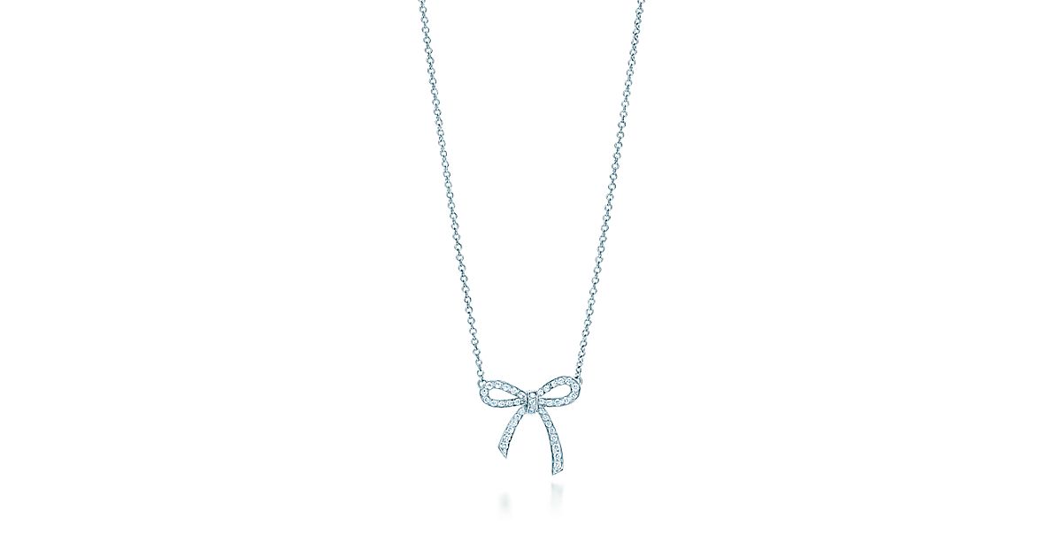Tiffany Bow pendant in platinum with diamonds, mini. | Tiffany & Co.